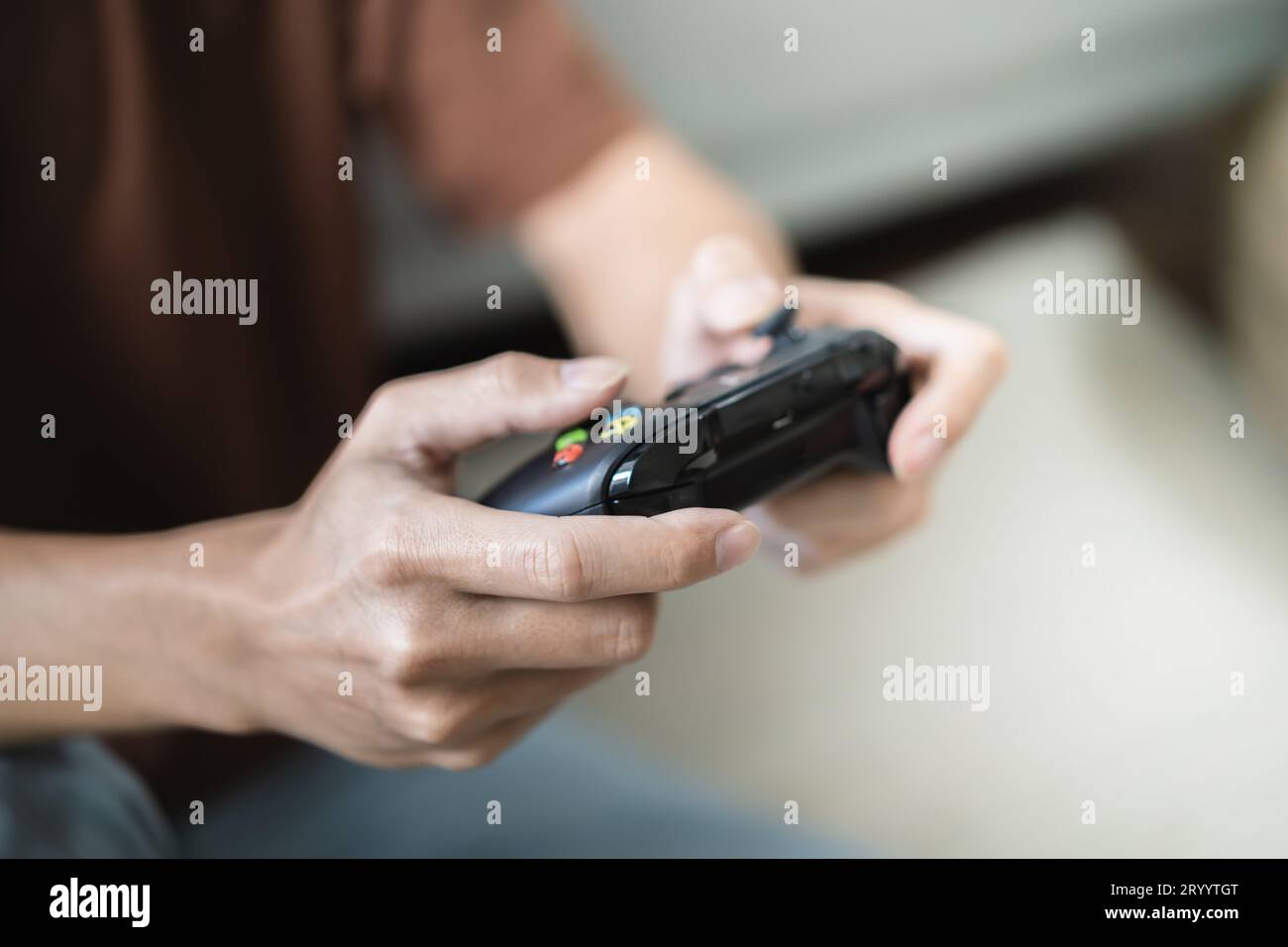 Young Asian man gamer controller video console playingÂ holding hobby ...