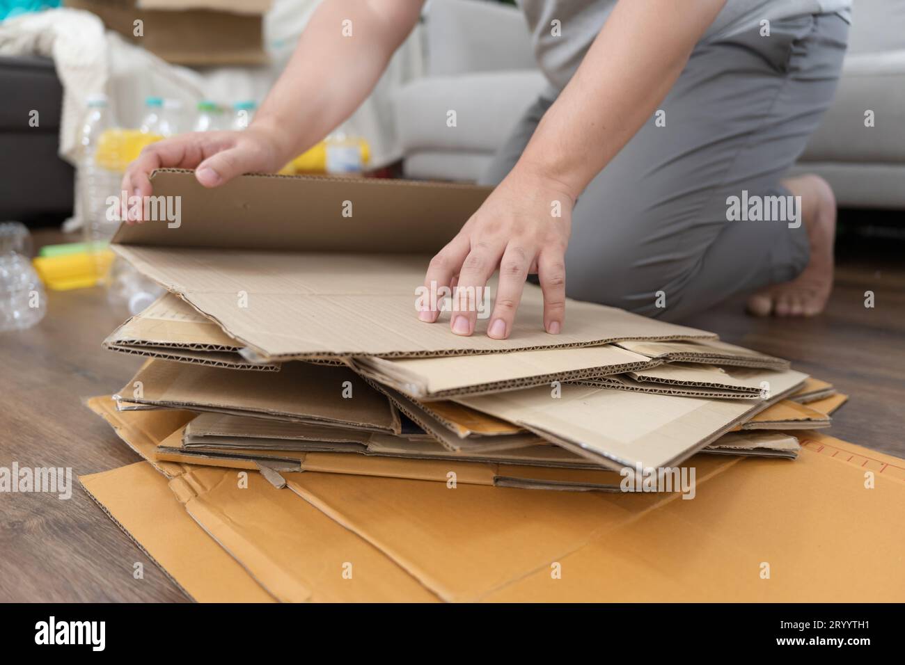 Home recycle eco zero waste concept Man using recycle paper box ...