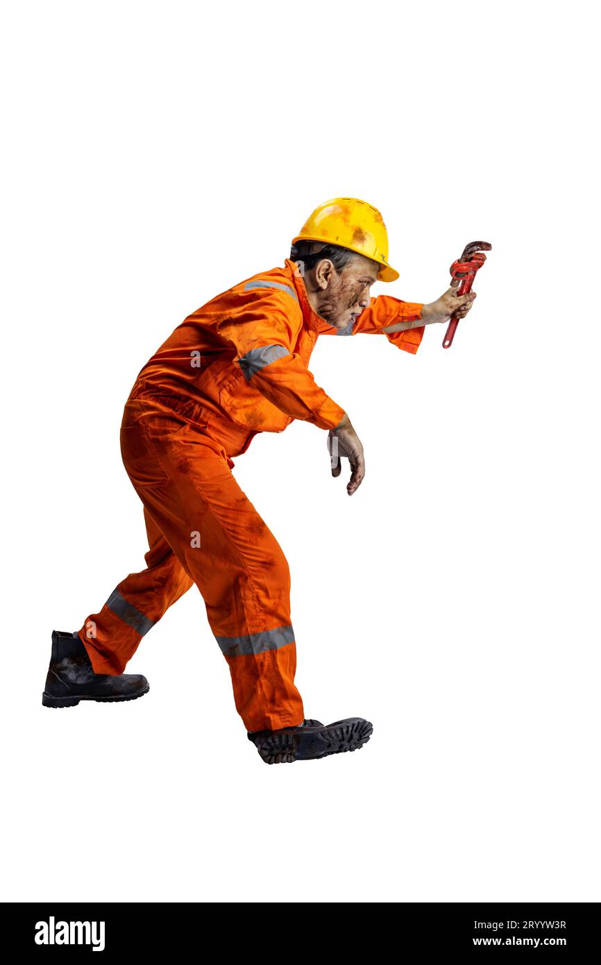 A scary construction worker zombie with blood and wounds on his body ...