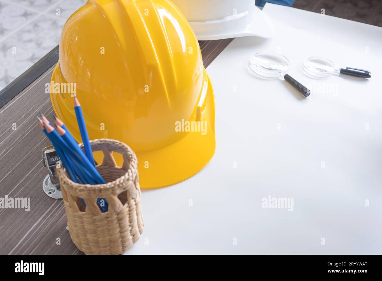 Top view of desk of engineering project in construction site or office ...