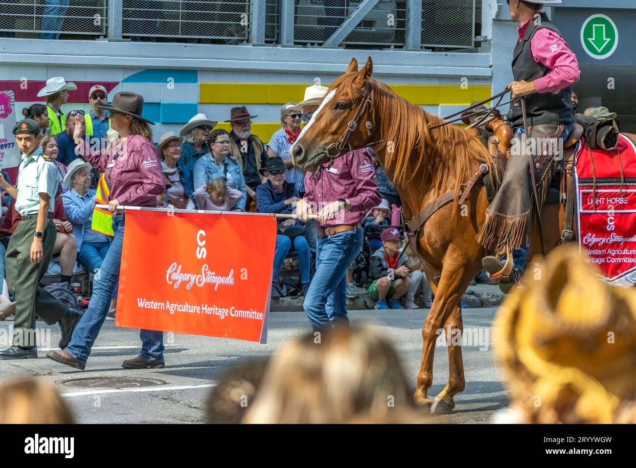 Calgary, Alberta, Canada. July 7, 2023. Some people holding a Calgary ...