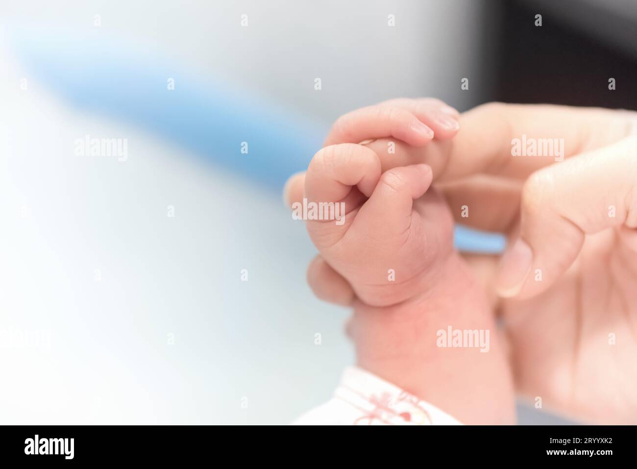 Newborn hand holding mother finger in hospital, Baby and Health care ...