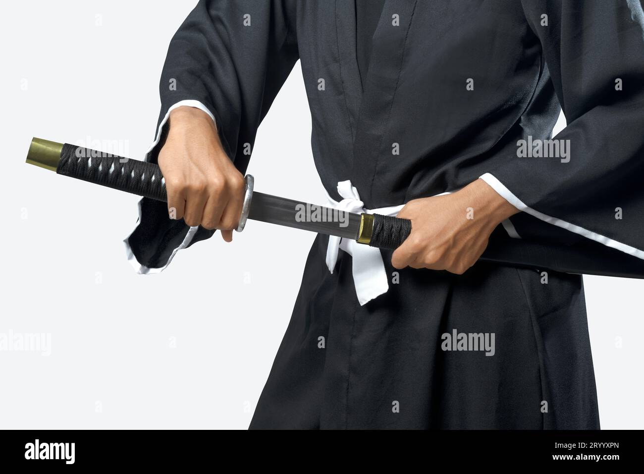 Samurai warrior gripping the sword isolated over white background Stock ...