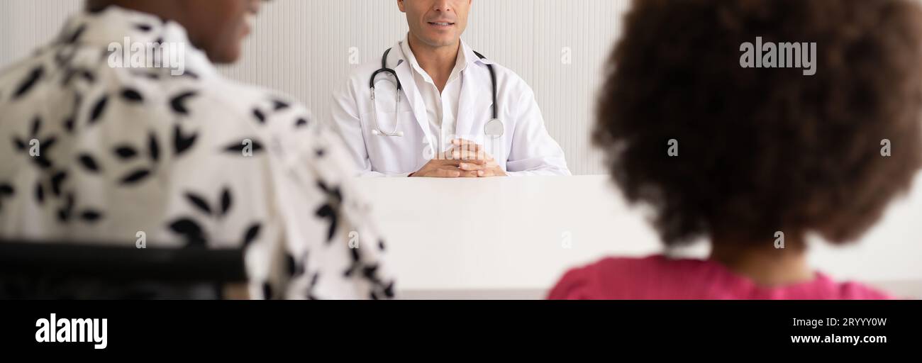 Hispanic physician meeting and diagnosis mixed-race afro children with ...