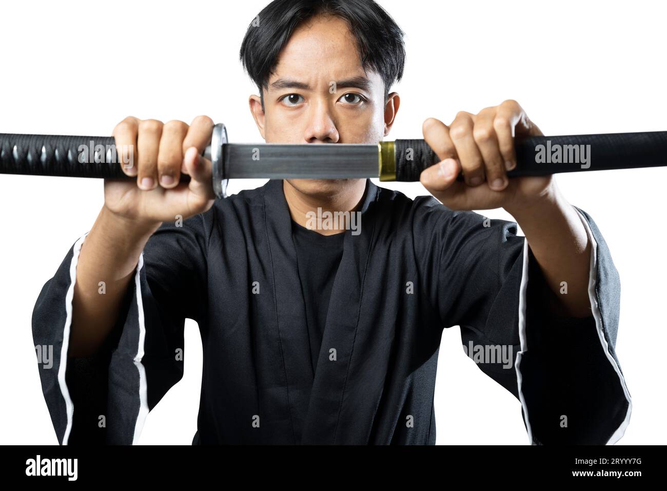 Samurai warrior gripping the sword isolated over white background Stock ...