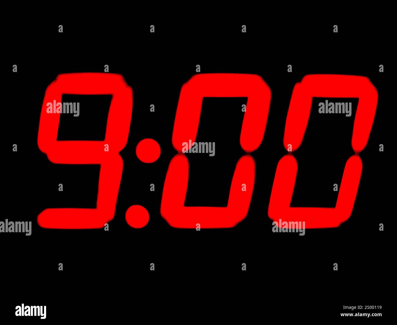 A digital clock face showing the time in red numbers on a black ...