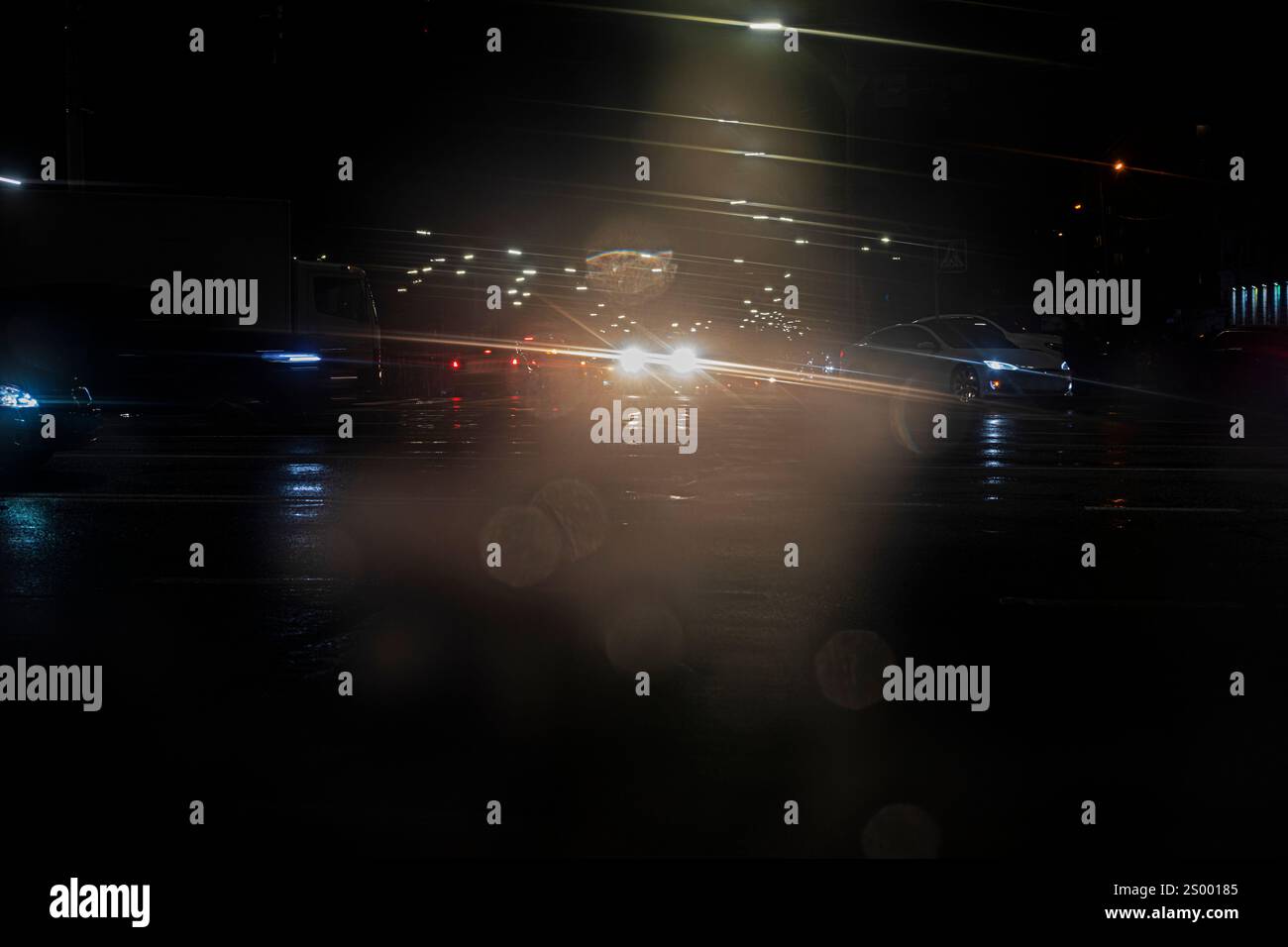 melted background on the front fogged car window in the rain in the ...