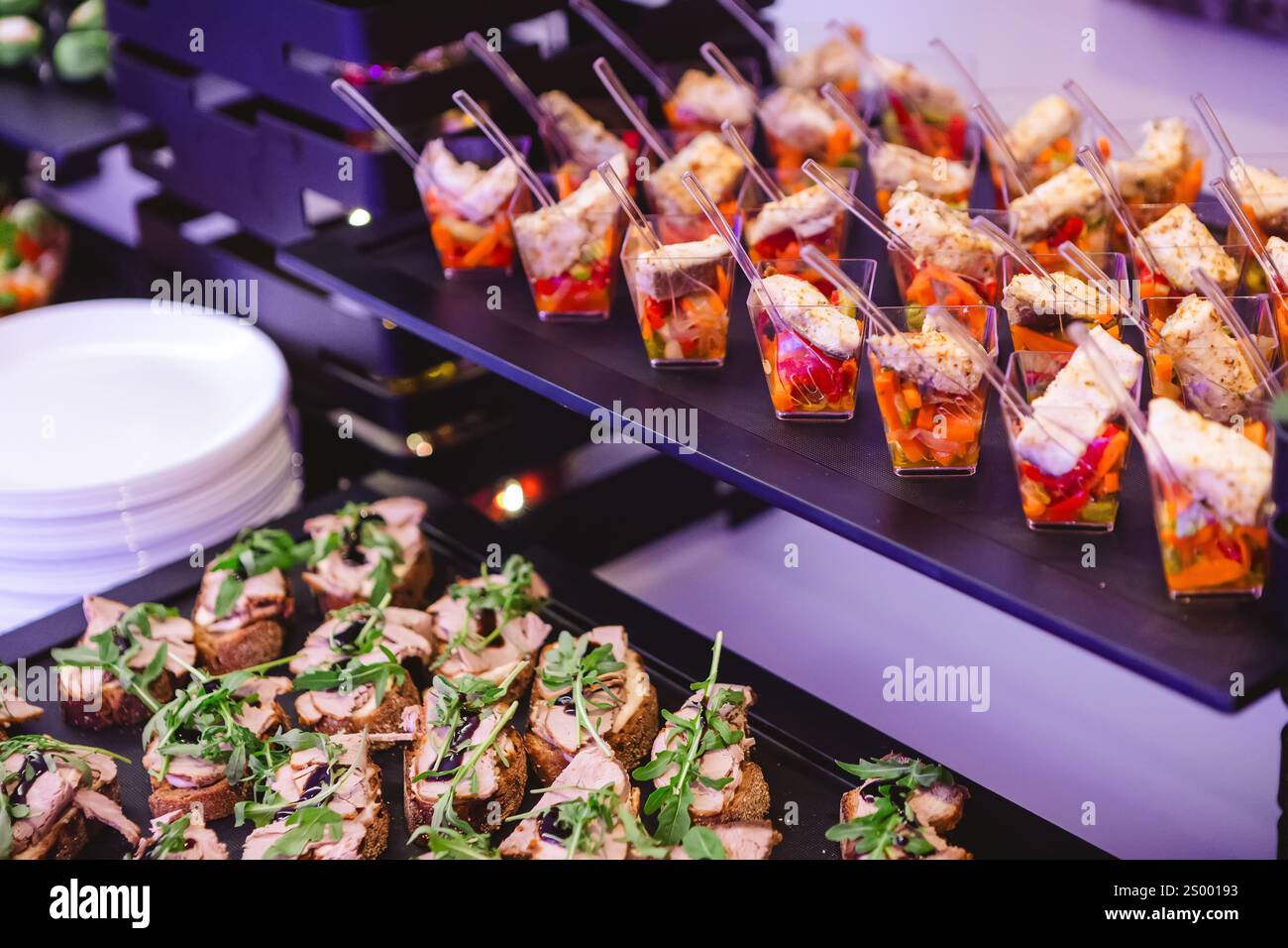 A contemporary hotel dining area featuring a sleek buffet setup Stock ...