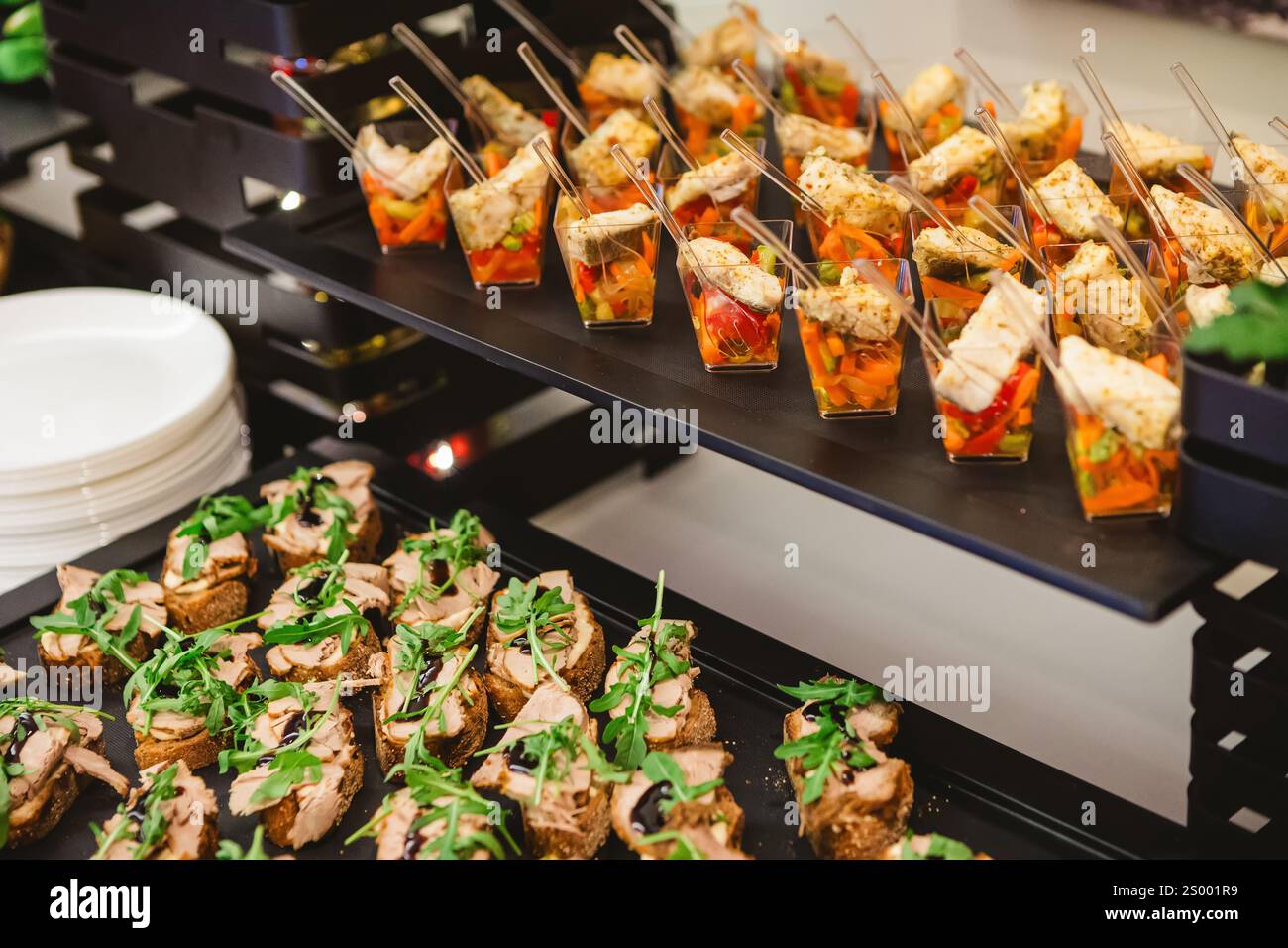 A contemporary hotel dining area featuring a sleek buffet setup Stock ...