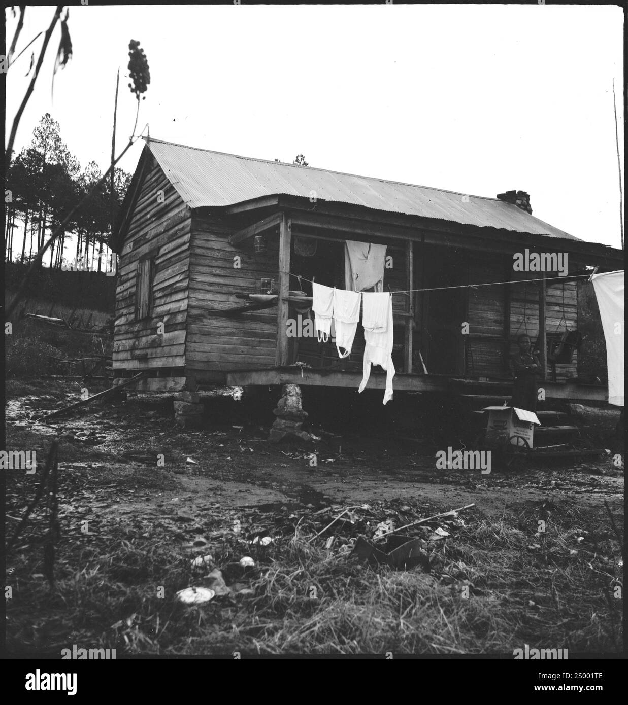 Birmingham, Alabama, USA. circa 1937. Housing- wooden hut, laundry ...