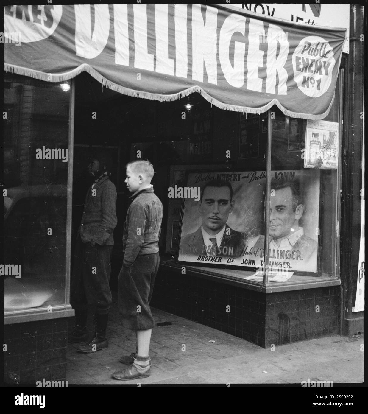 Knoxville, Tennessee, USA. People; Two boys looking at shop windows ...