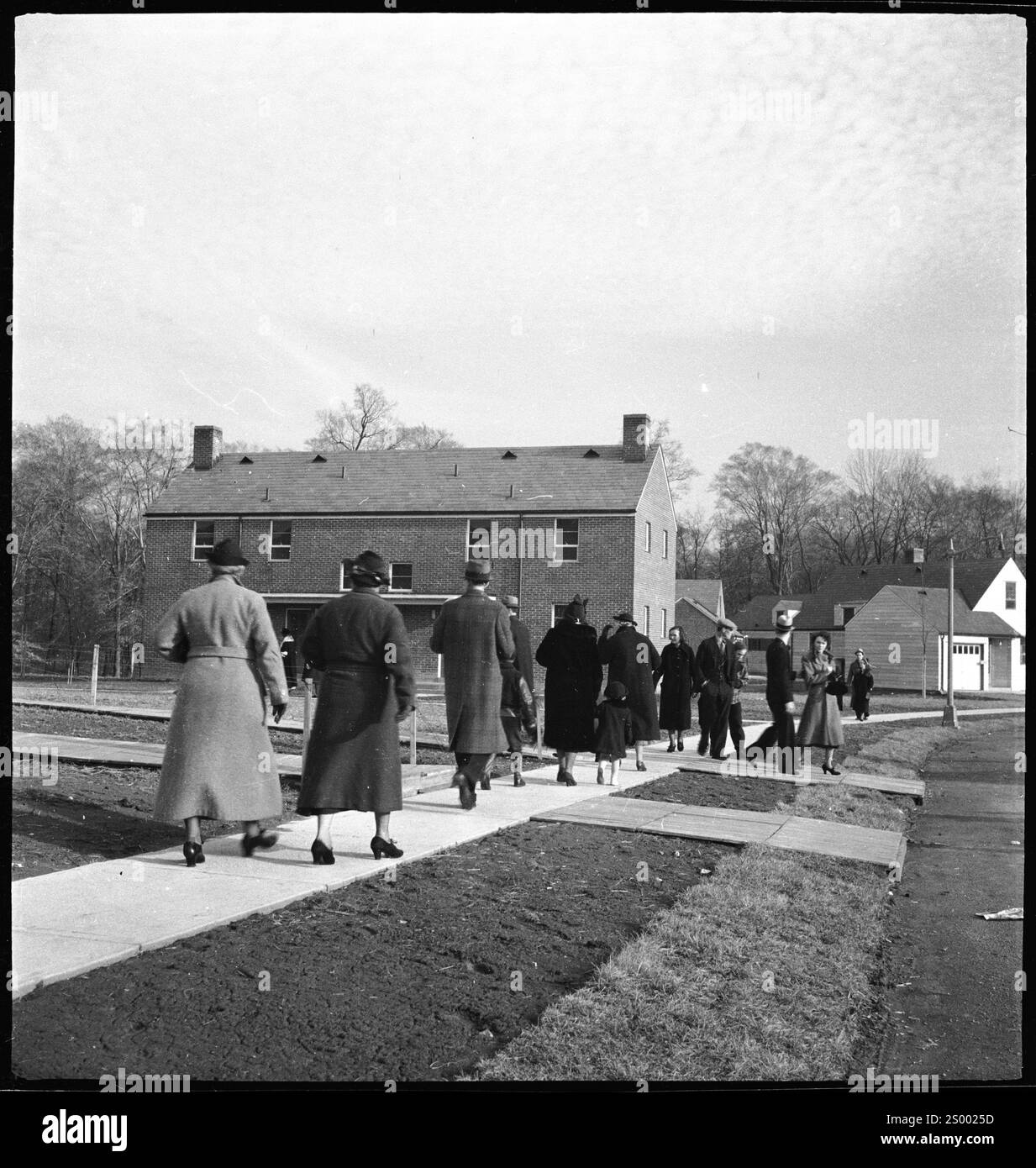 Greenhills, Ohio, USA. 1938. Resettlement Project; people on a street ...