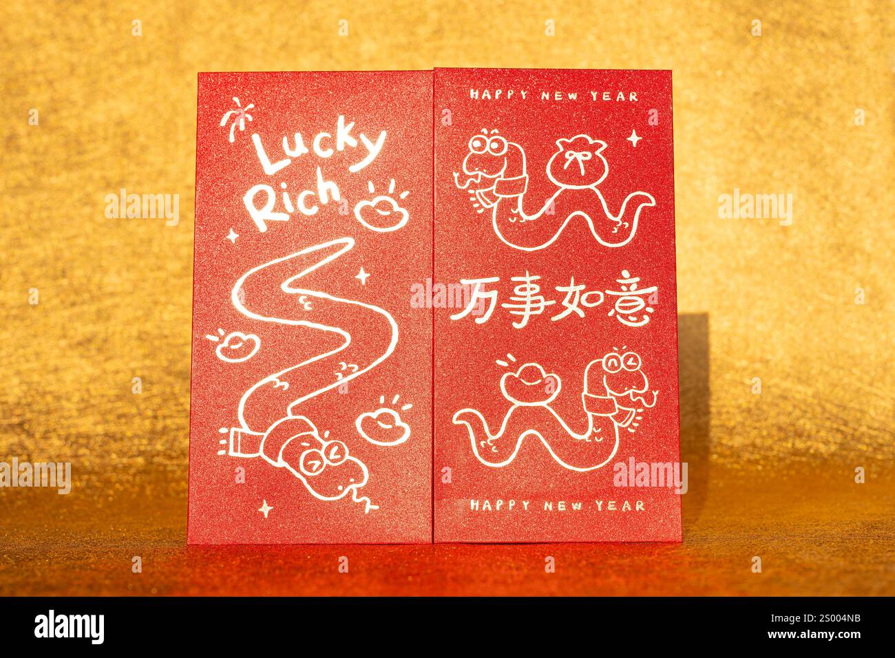 two red pockets for year of the Snake on gold background translation of ...