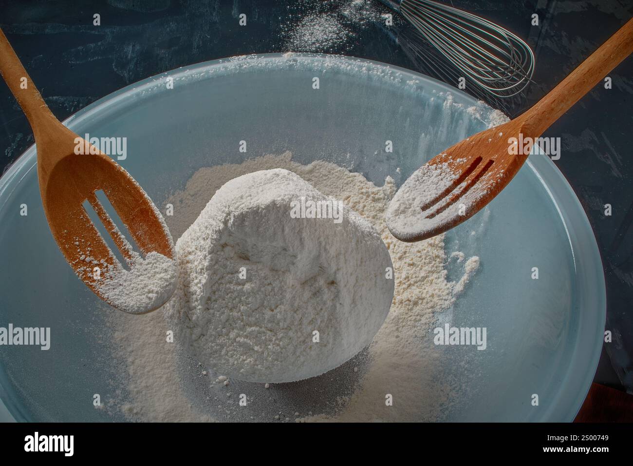 Flour, mixing bowl and kitchen tools Stock Photo - Alamy
