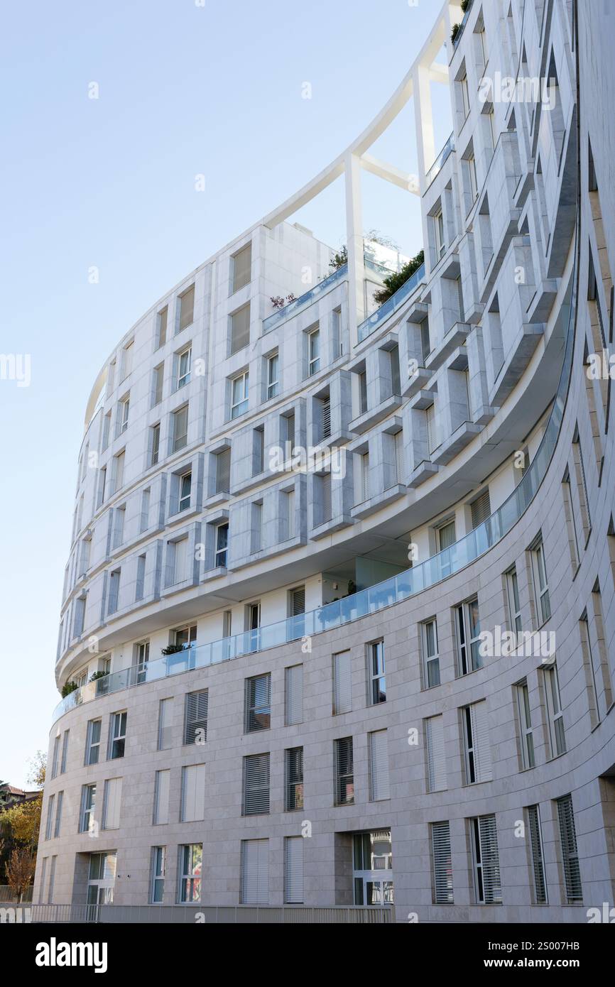 Modern architectural curvilinear building in cold sunlight Stock Photo ...