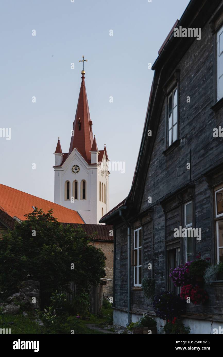 Small old town church tower with cross Stock Photo - Alamy
