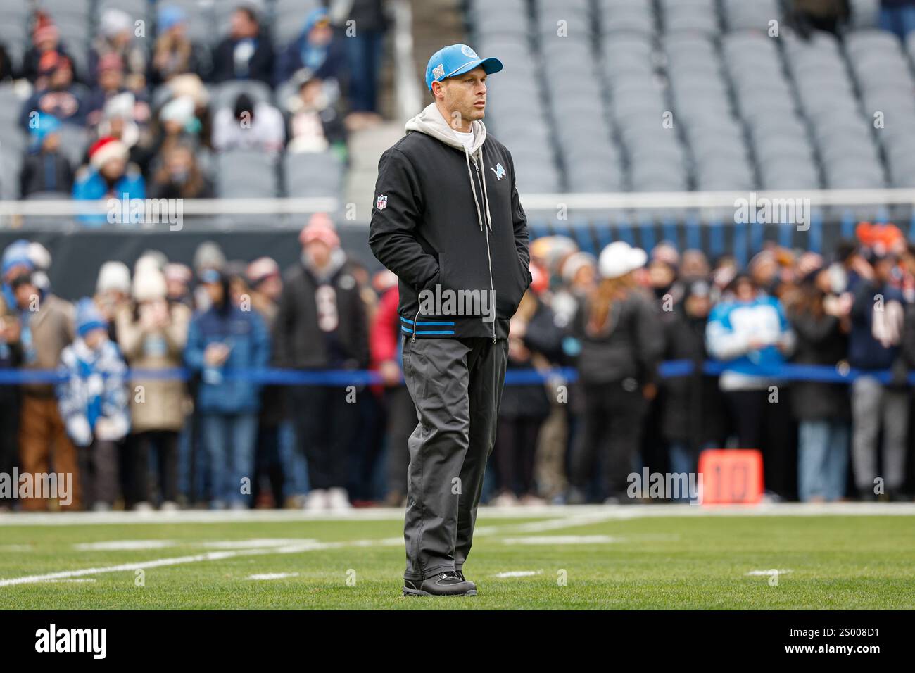 Detroit Lions offensive coordinator Ben Johnson walks on Soldier Field ...