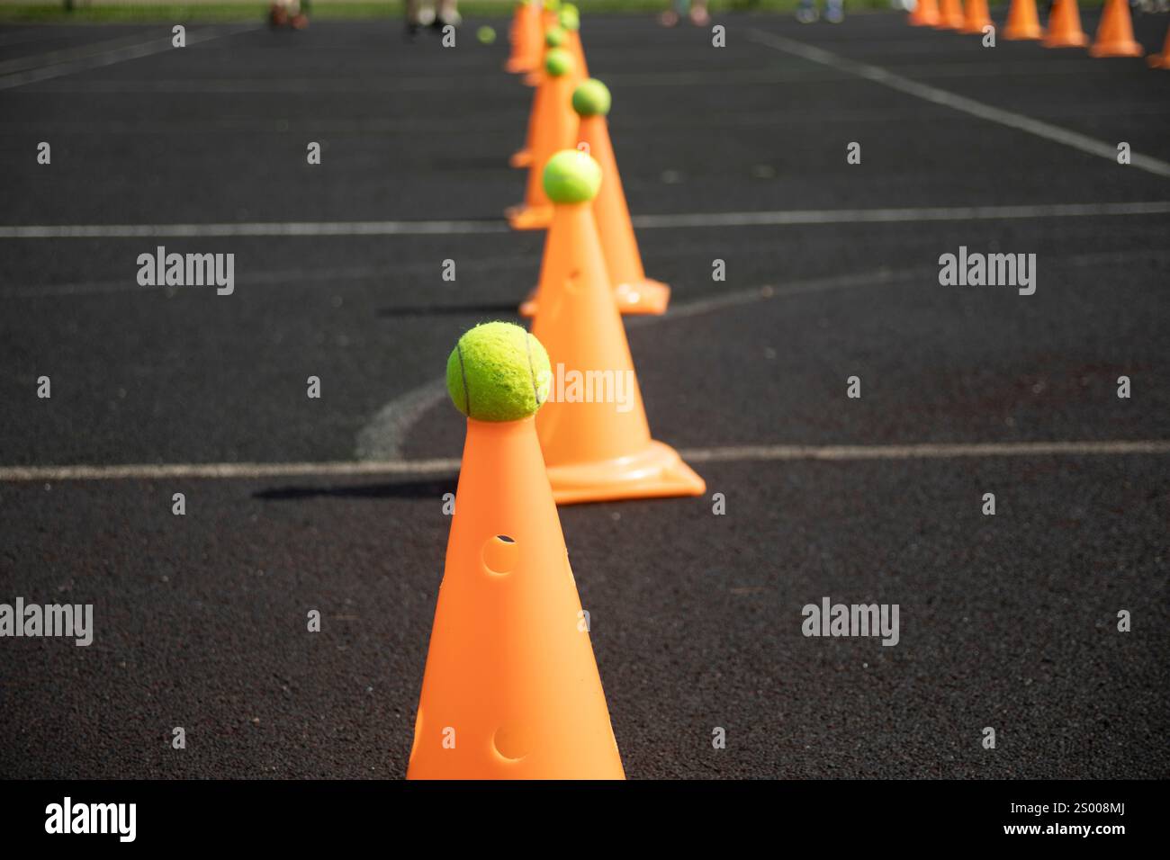 Sports ground. Playground equipment. Orange cone Stock Photo - Alamy