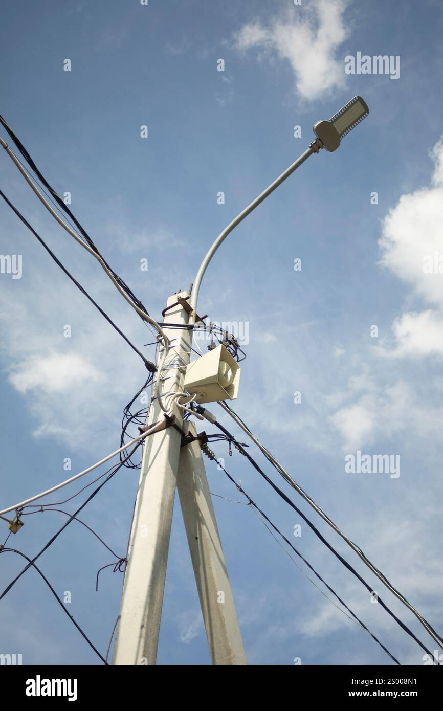A loudspeaker on a pole. A device for signaling. A speaker for ...