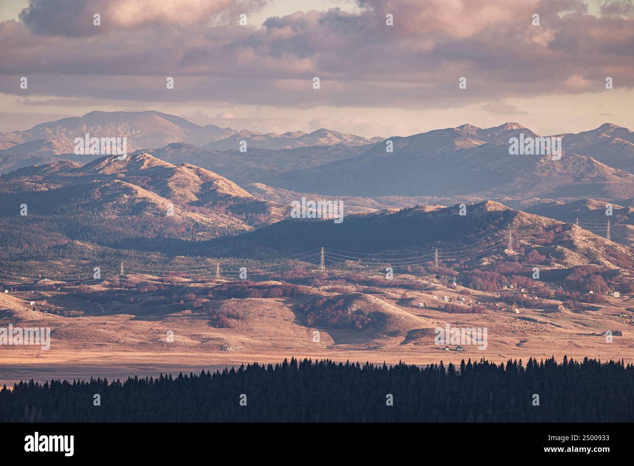 Stunning view of vast mountain ranges in Montenegro, with power lines ...