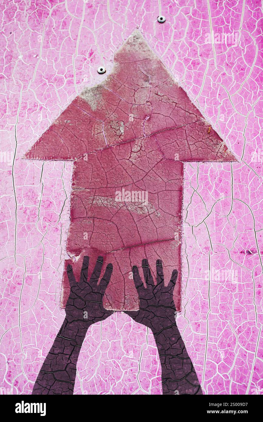 Hands pushing a weathered arrow upwards Stock Photo - Alamy