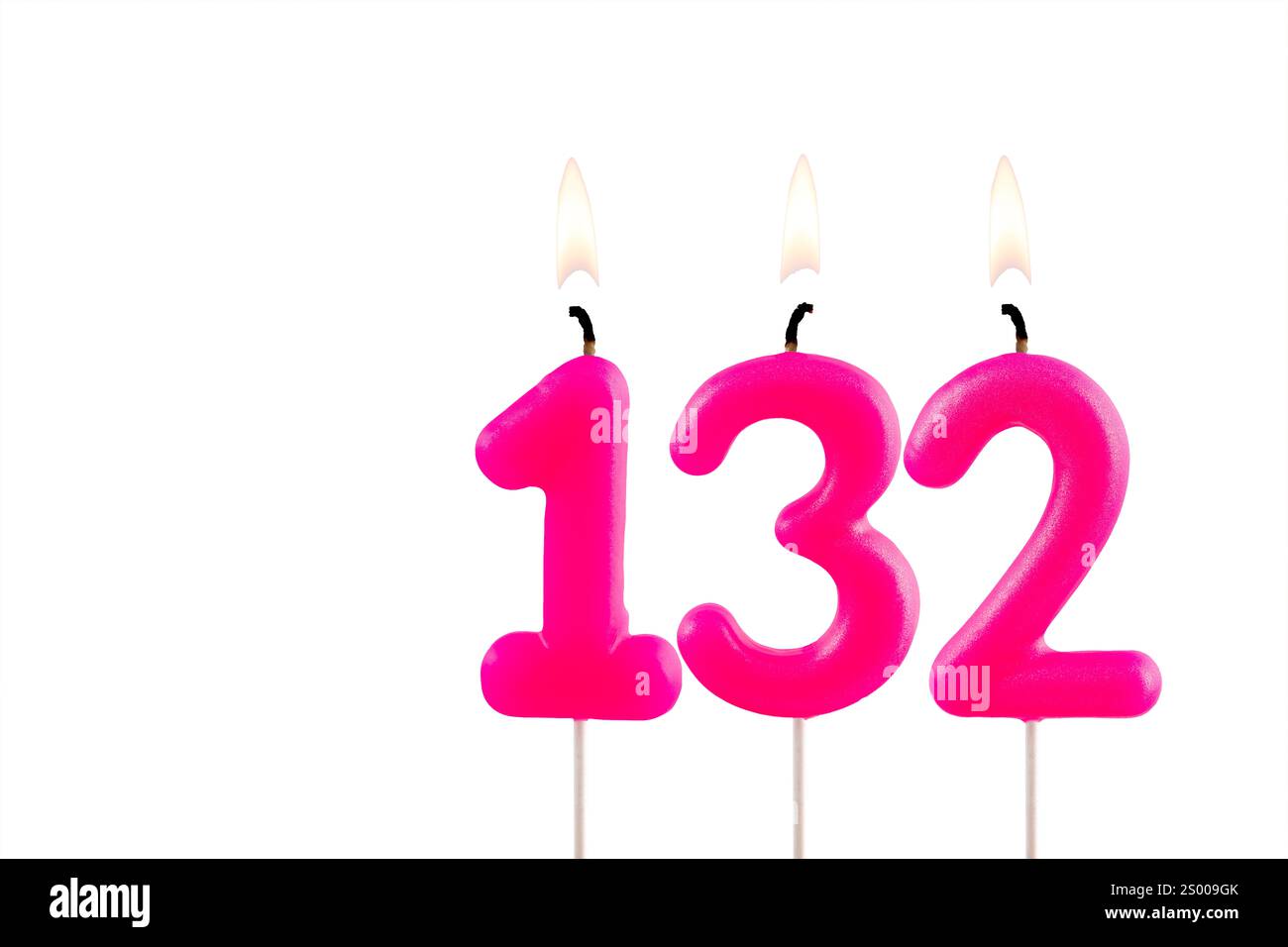 Pink number 132 birthday candle lit on white background Stock Photo - Alamy