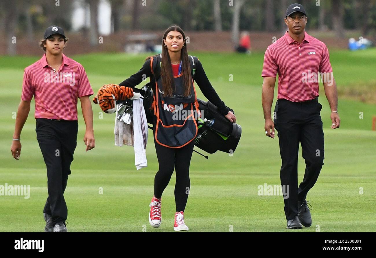 Orlando, United States. 22nd Dec, 2024. Tiger Woods (R), his daughter ...