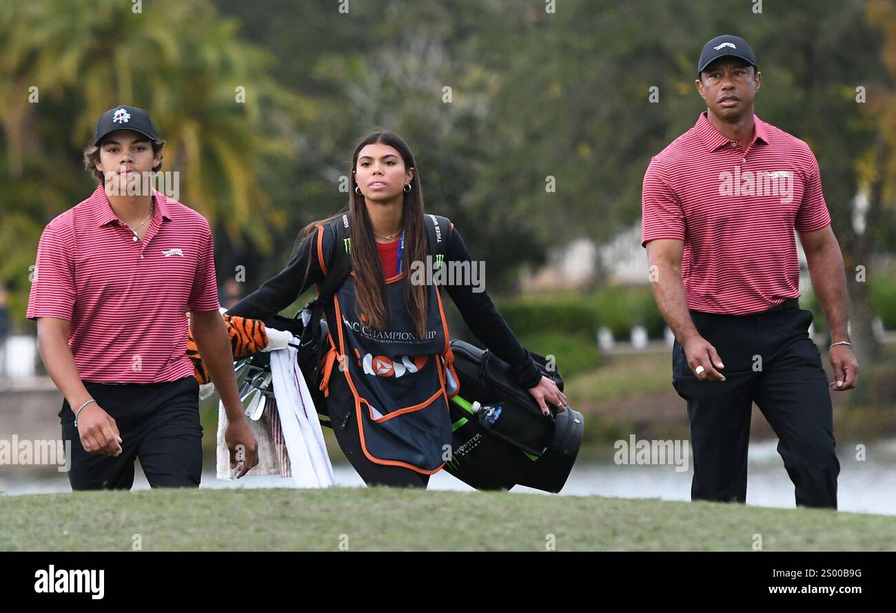 Orlando, United States. 22nd Dec, 2024. Tiger Woods (R), his daughter ...