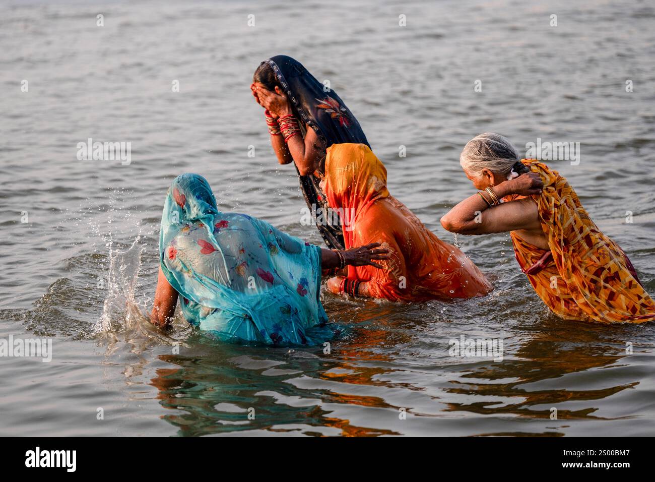 Hindu devotees take a holy dip at Sangam, ahead of the Maha Kumbh Mela ...