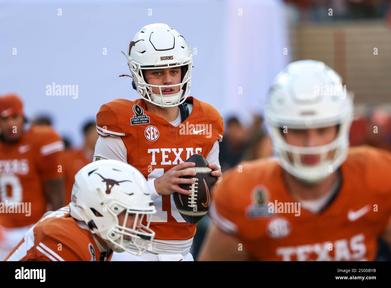 AUSTIN, TX - DECEMBER 21: Texas Longhorns quarterback Arch Manning (16) warms up by running ...