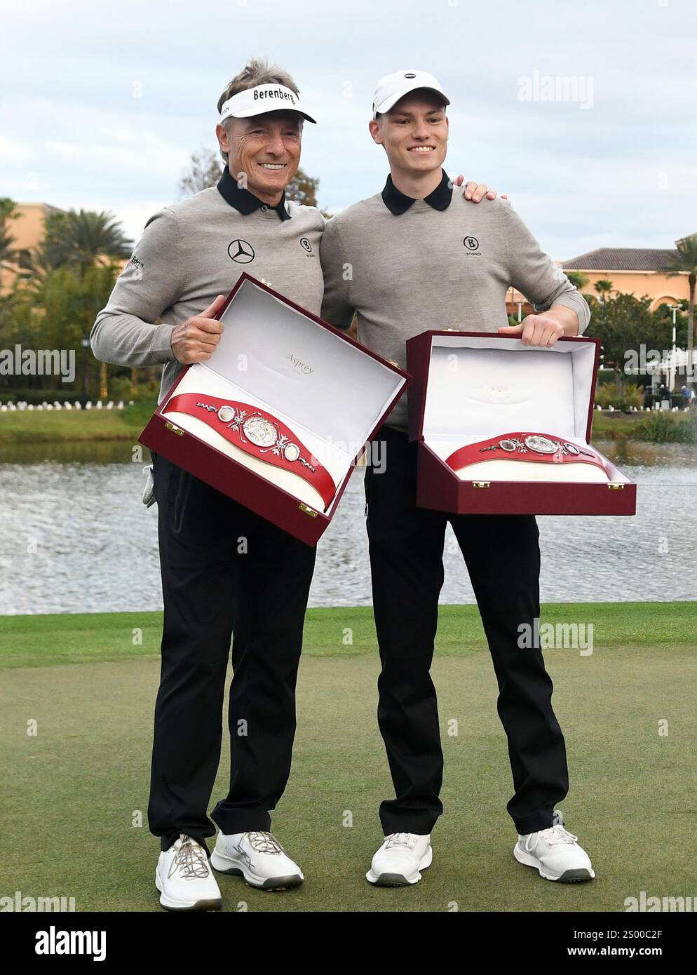 Bernhard Langer and his son, Jason Langer pose with their trophies ...