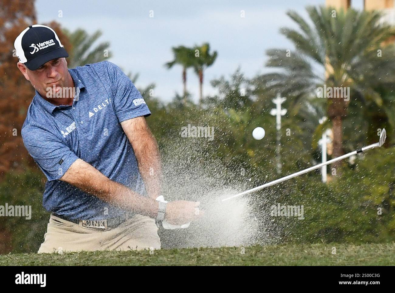 Stewart Cink plays a shot from a bunker on the 18th hole during the ...