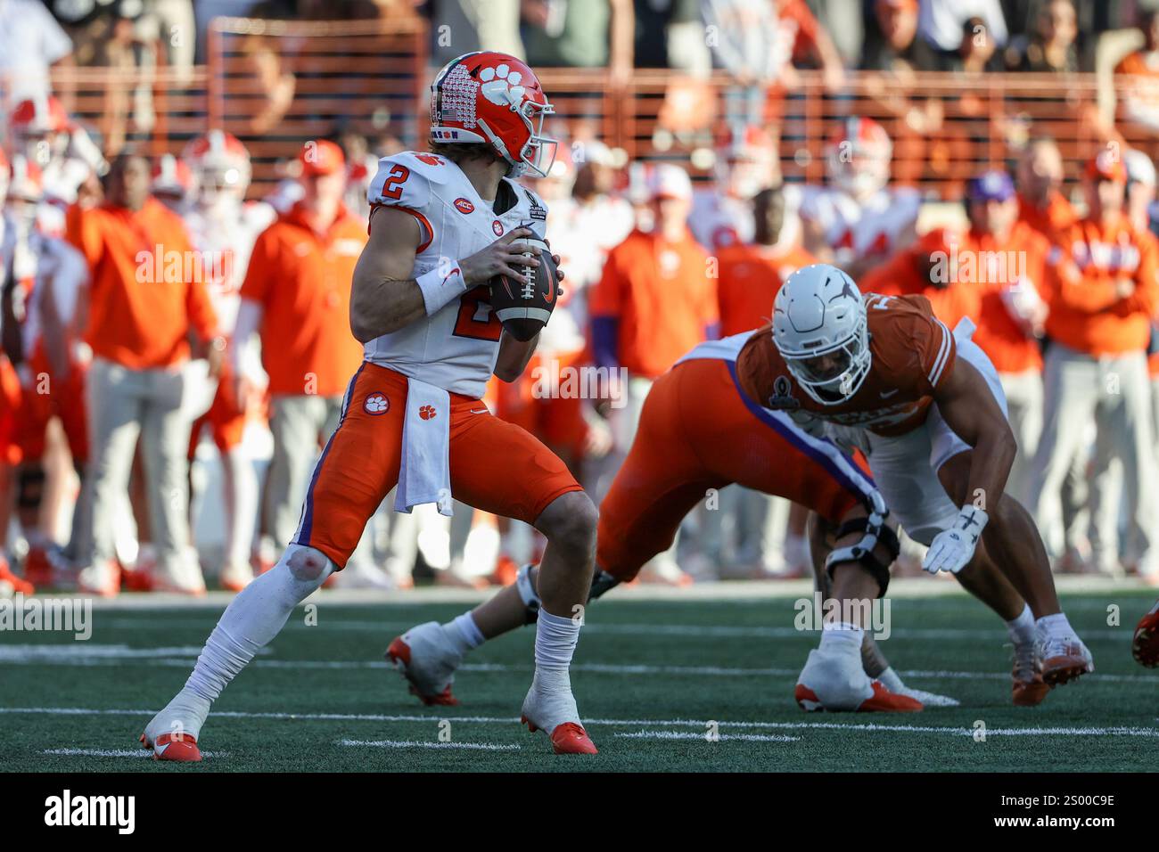 AUSTIN, TX - DECEMBER 21: Clemson Tigers quarterback Cade Klubnik (2) drops back and readies to ...