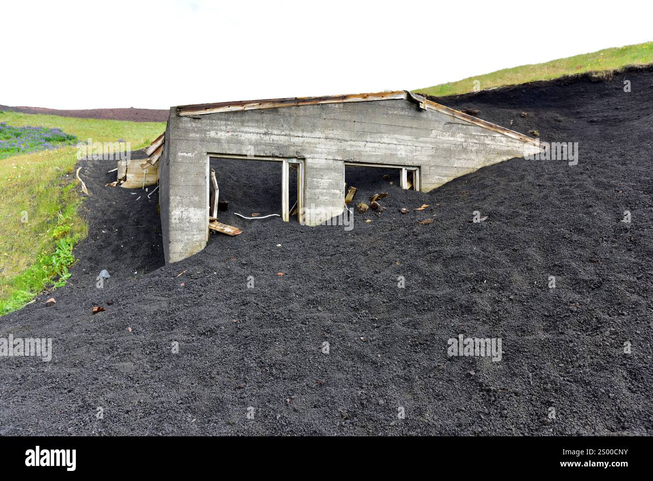 Heimaey, house affected by the eruption of Eldfell volcano in 1973 ...