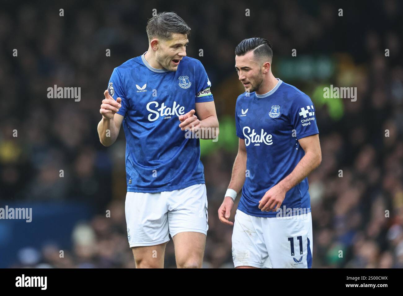Liverpool, UK. 22nd Dec, 2024. James Tarkowski of Everton speaks to ...