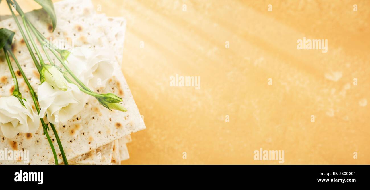 Passover celebration concept. Matzah, bouquet of flowers and walnut on ...