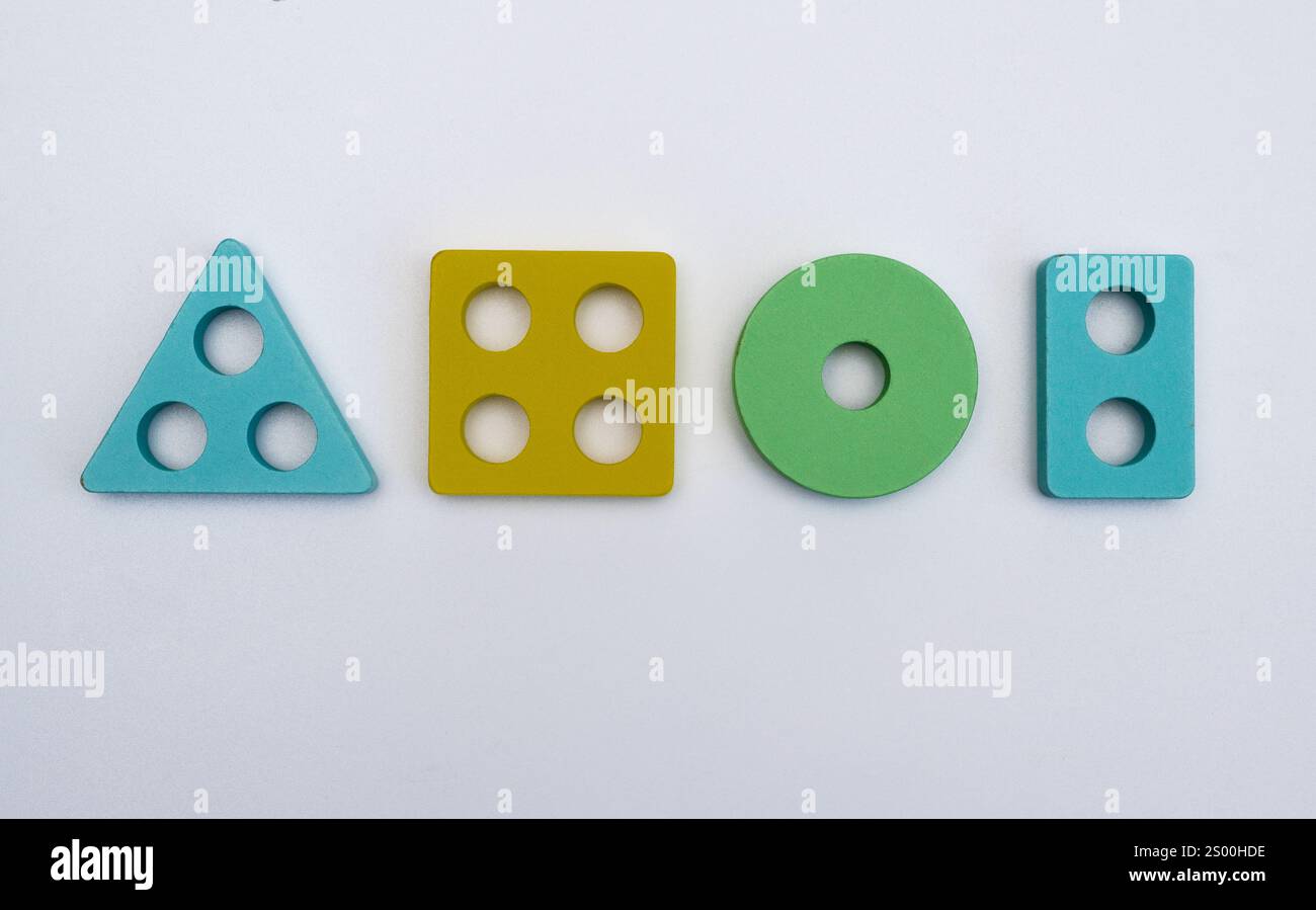 Four different geometric shapes - triangle, square, circle, rectangle ...