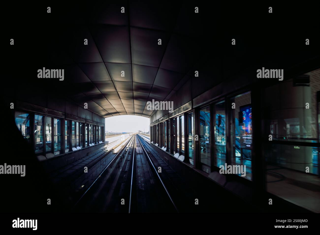 Dubai, UAE - December 9, 2024: Metro station in Dubai.View from window ...
