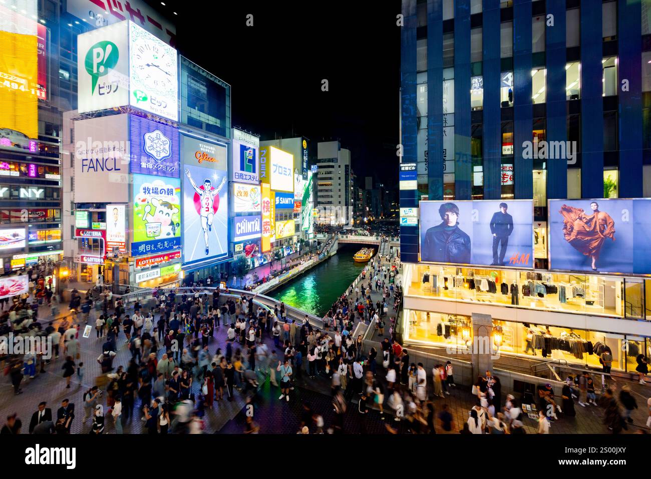 OSAKA, JAPAN - SEPTEMBER 25 2024: The view of the buildings and signage ...
