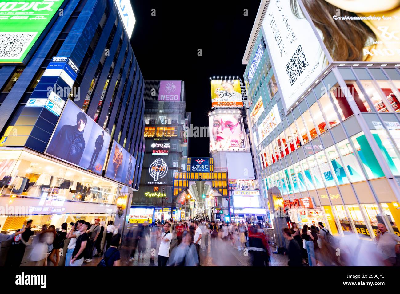 OSAKA, JAPAN - SEPTEMBER 25 2024: The view of the buildings and signage ...