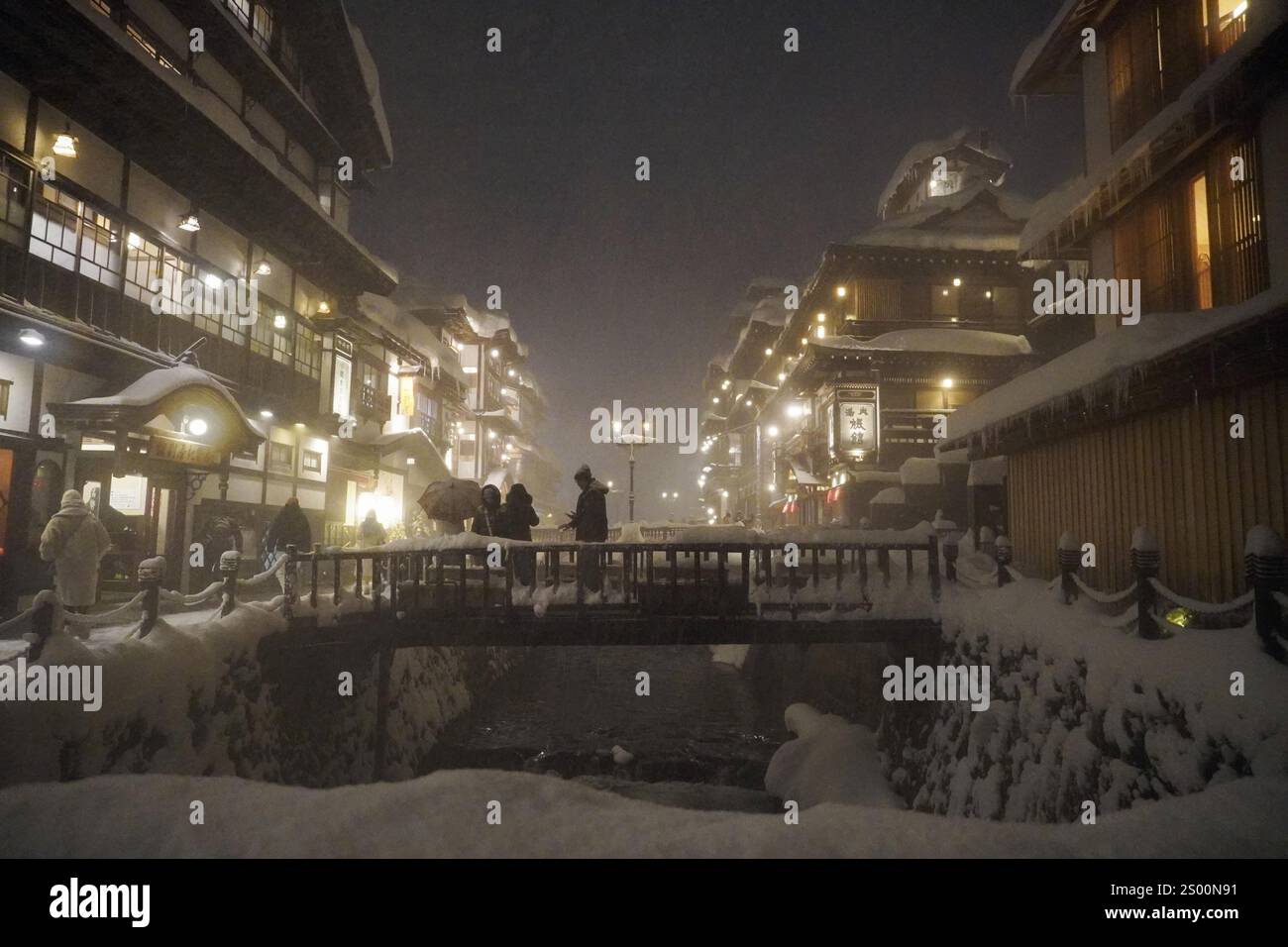 Ginzan Onsen hot spring resort is snow-covered in Obanazawa in Yamagata ...