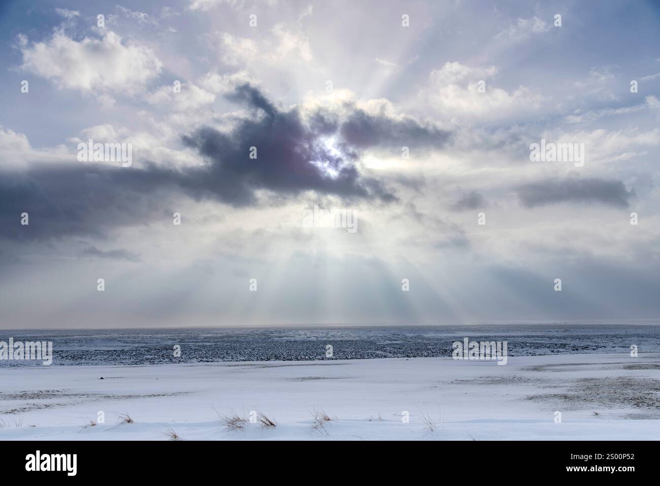 Panoramic winter landscape in Iceland with white and black clouds over ...