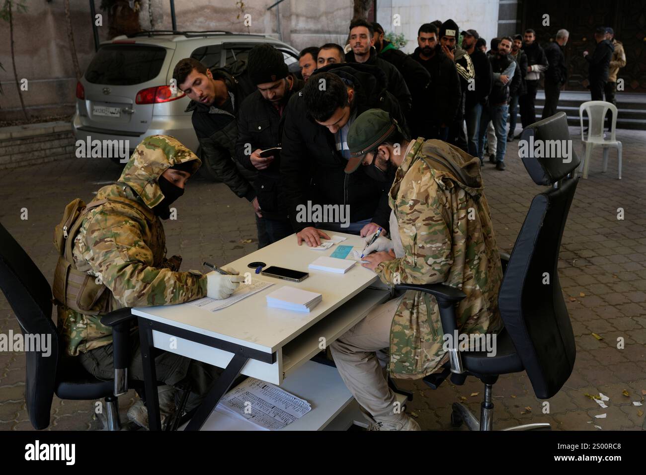 Members of ousted Syrian President Bashar Assad's army and pro ...