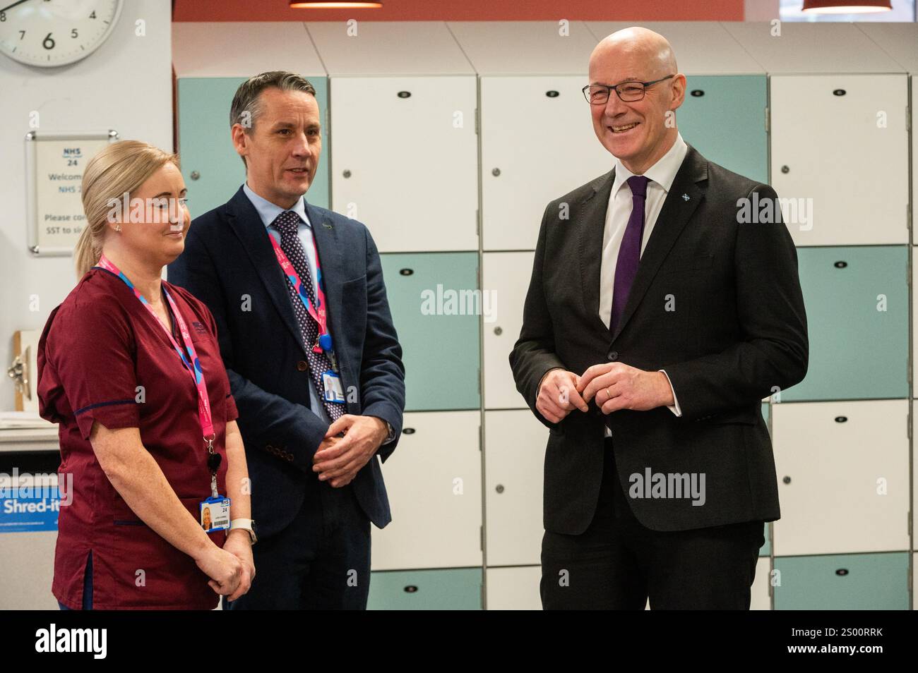 First Minister John Swinney with Patrick Rafferty Assistant Director of ...