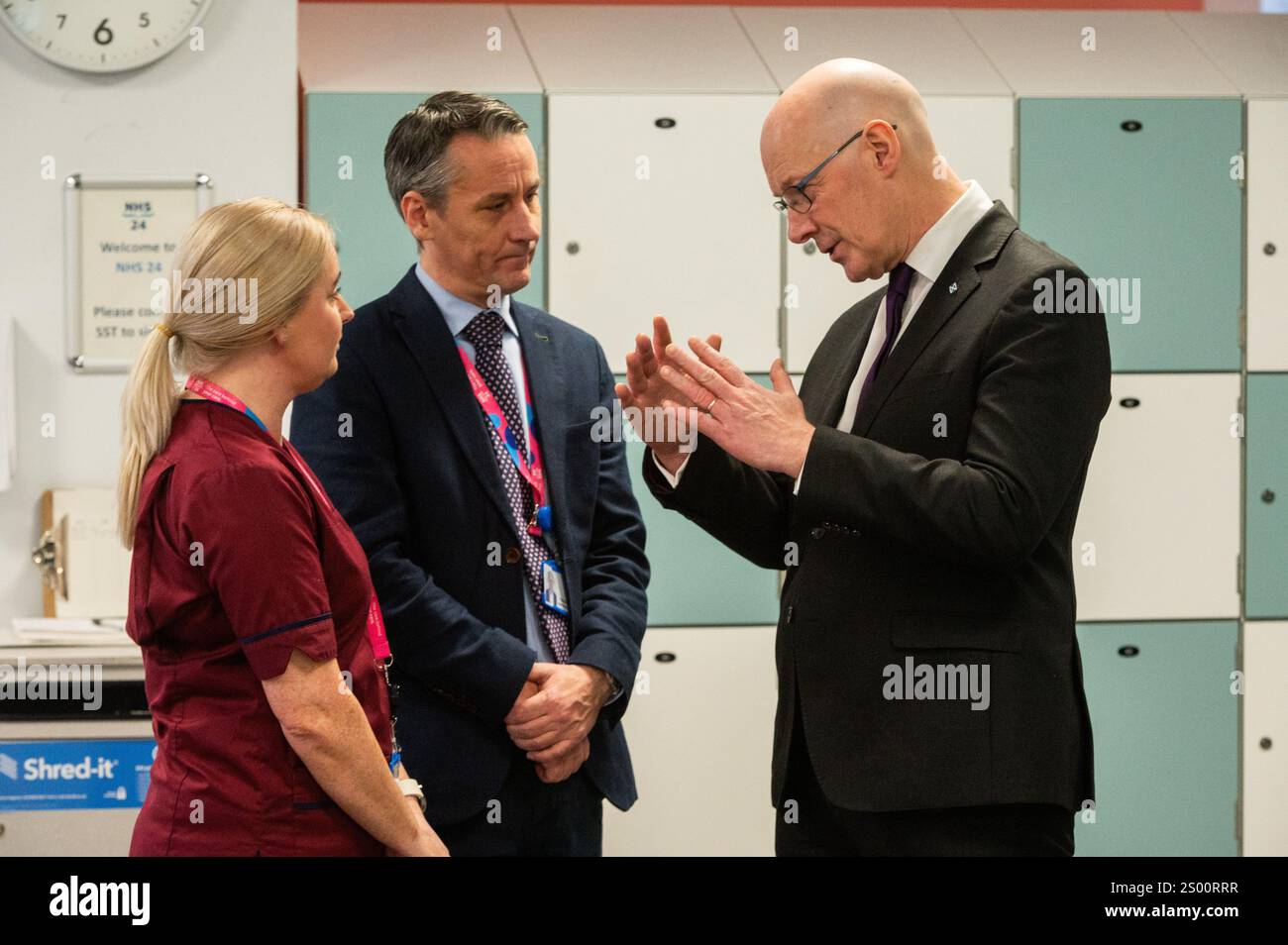 First Minister John Swinney with Patrick Rafferty Assistant Director of ...