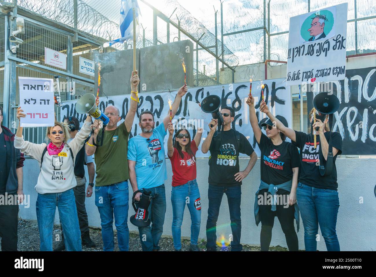Kishon, Israel - December 21, 2024: Protesters with party flares, near ...