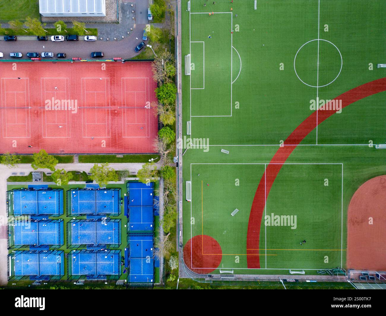 Aerial view of orange tennis courts and blue colored padel courts Stock ...