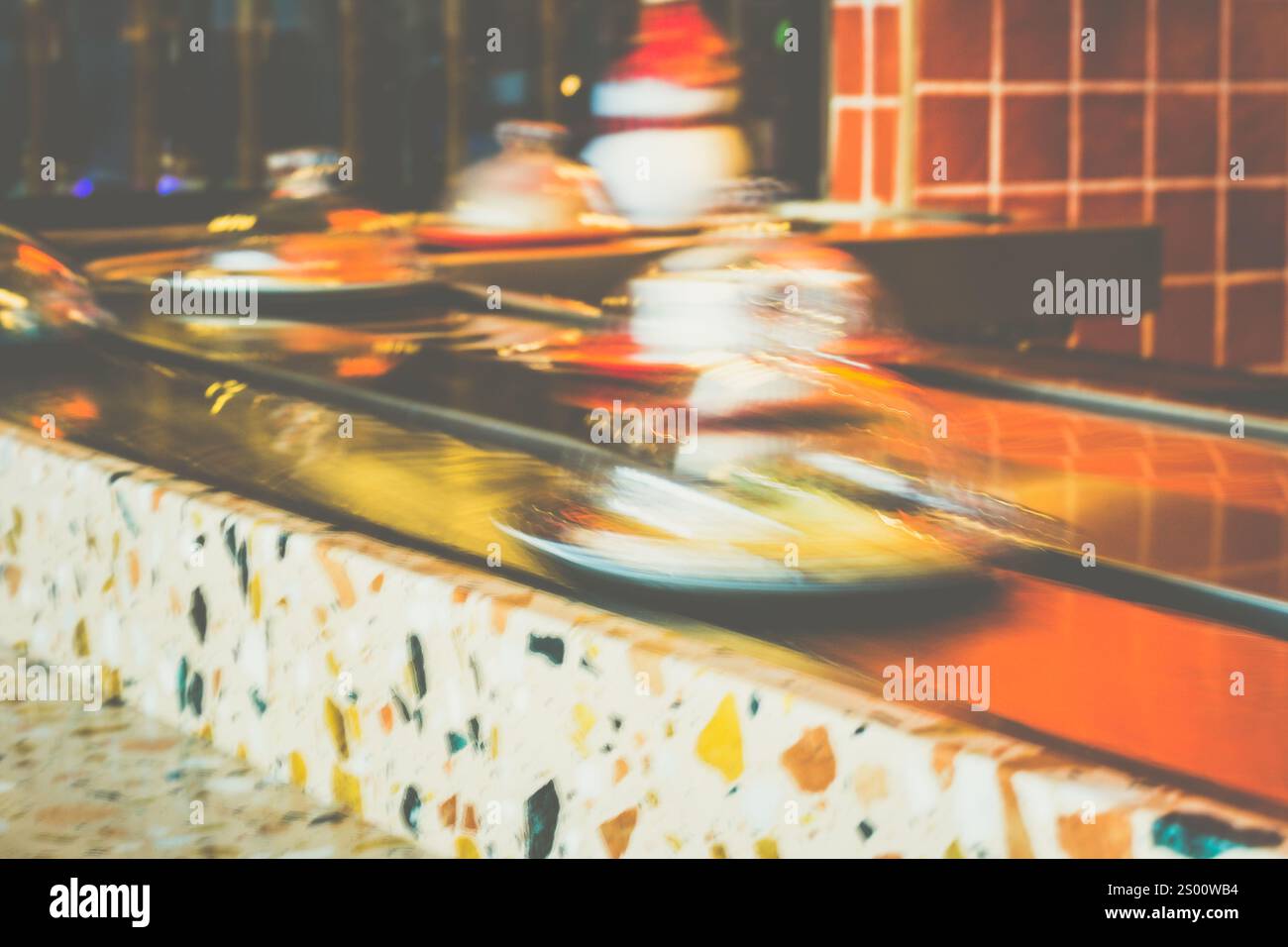 italian tapas served on small plates and put on a coveyor belt in a ...