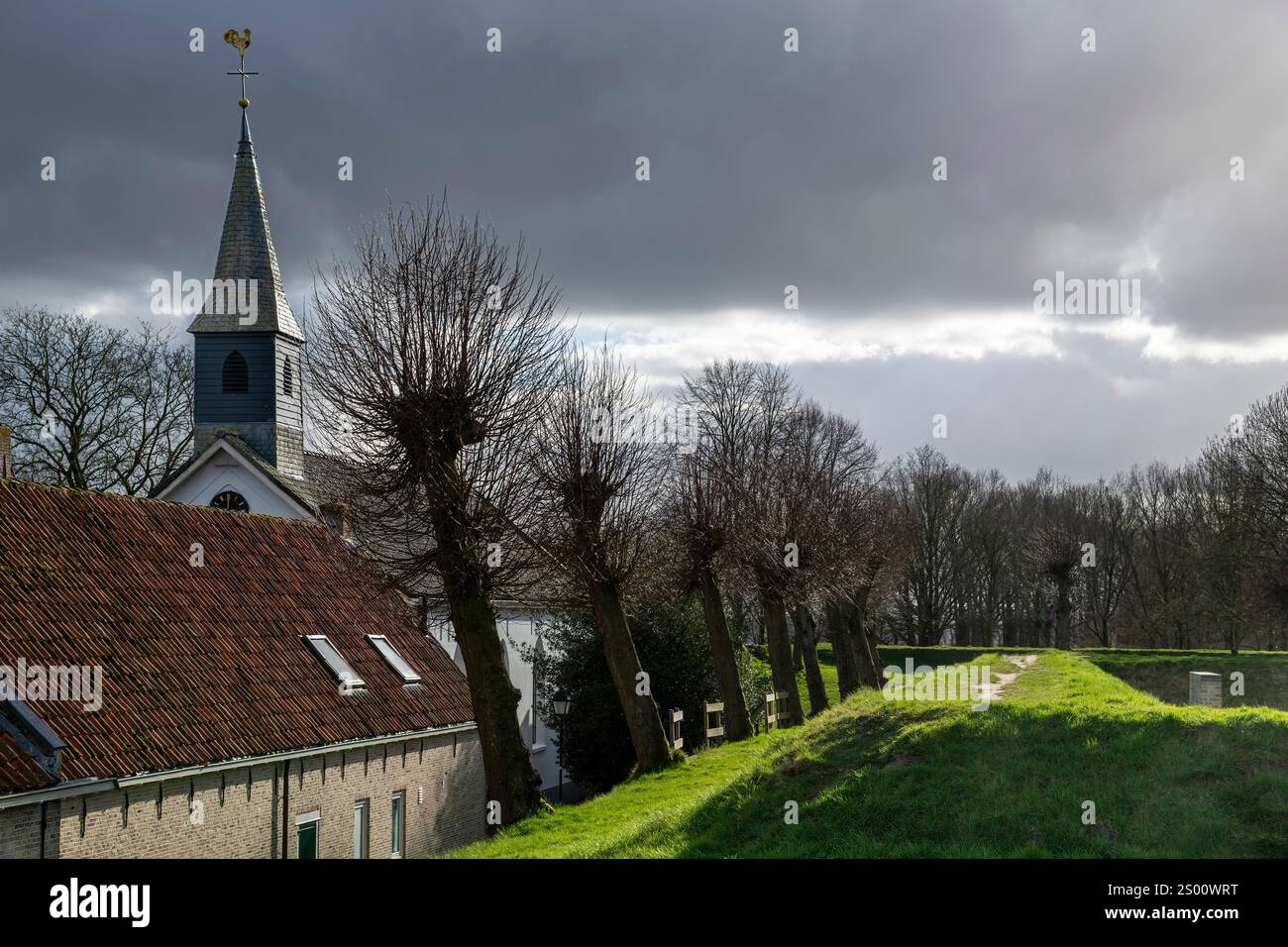 View over grass overgrown rampart around the village of Bourtange ...