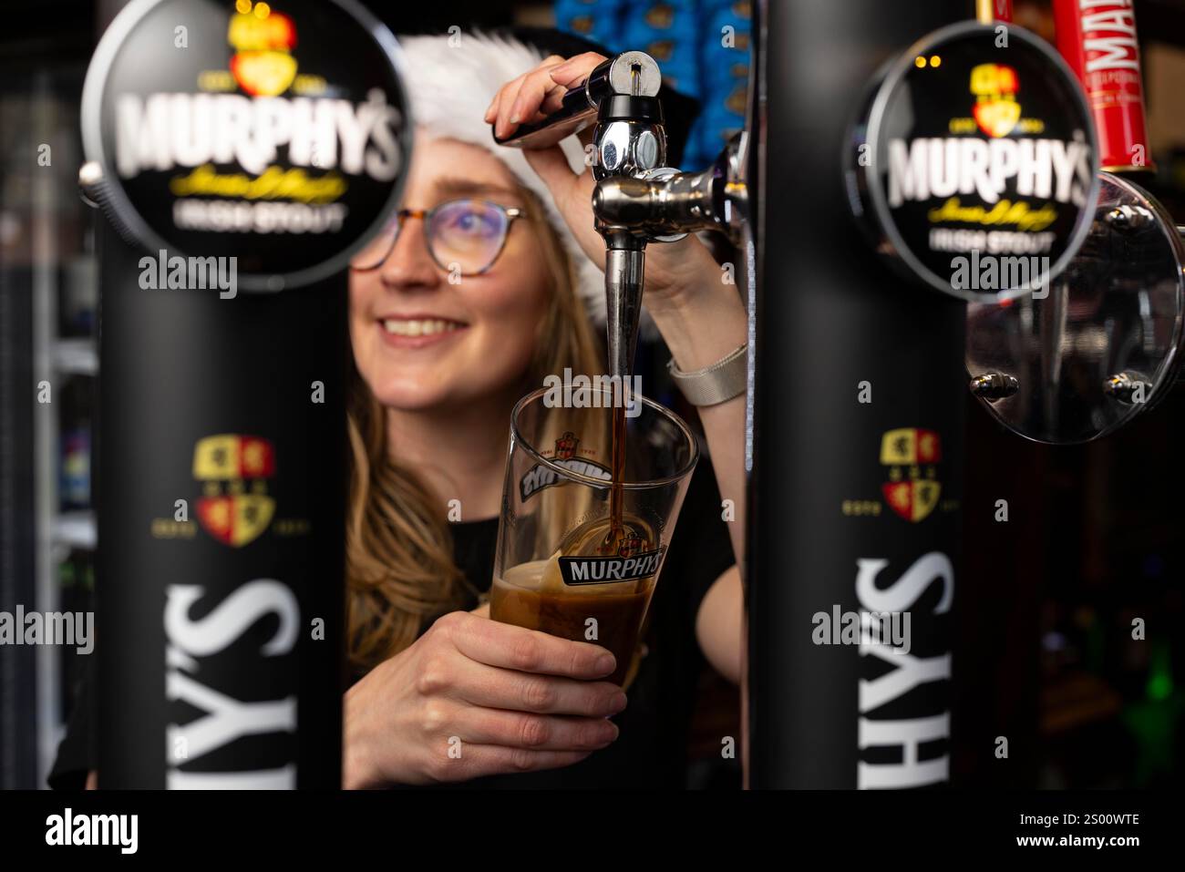 EDITORIAL USE ONLY A pint of Murphy's Irish Stout is poured after being ...